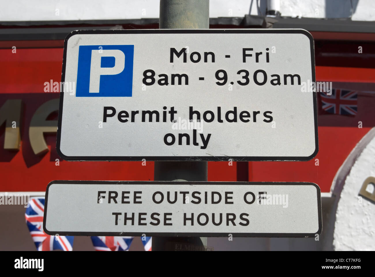 parking signs detailing parking restrictions, with days and times, and ...