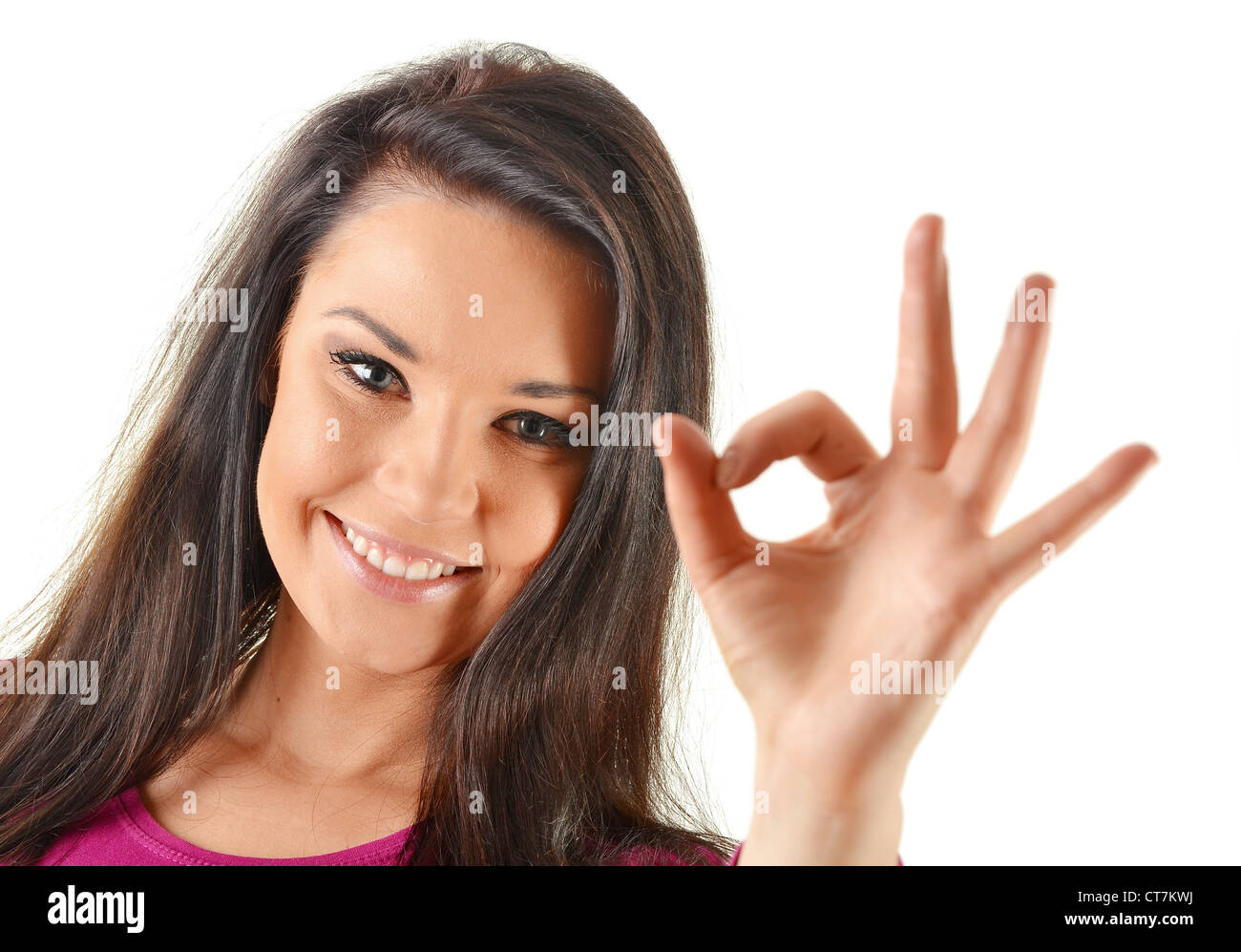Young attractive woman showing ok isolated on white Stock Photo - Alamy