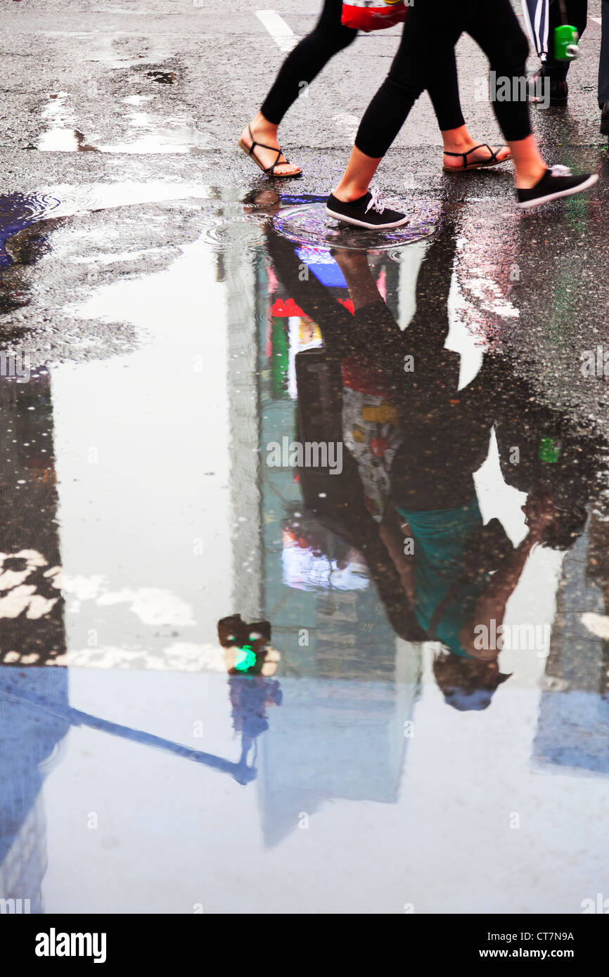 Iconic New York City in Times Square, Manhattan. Reflections from the ...