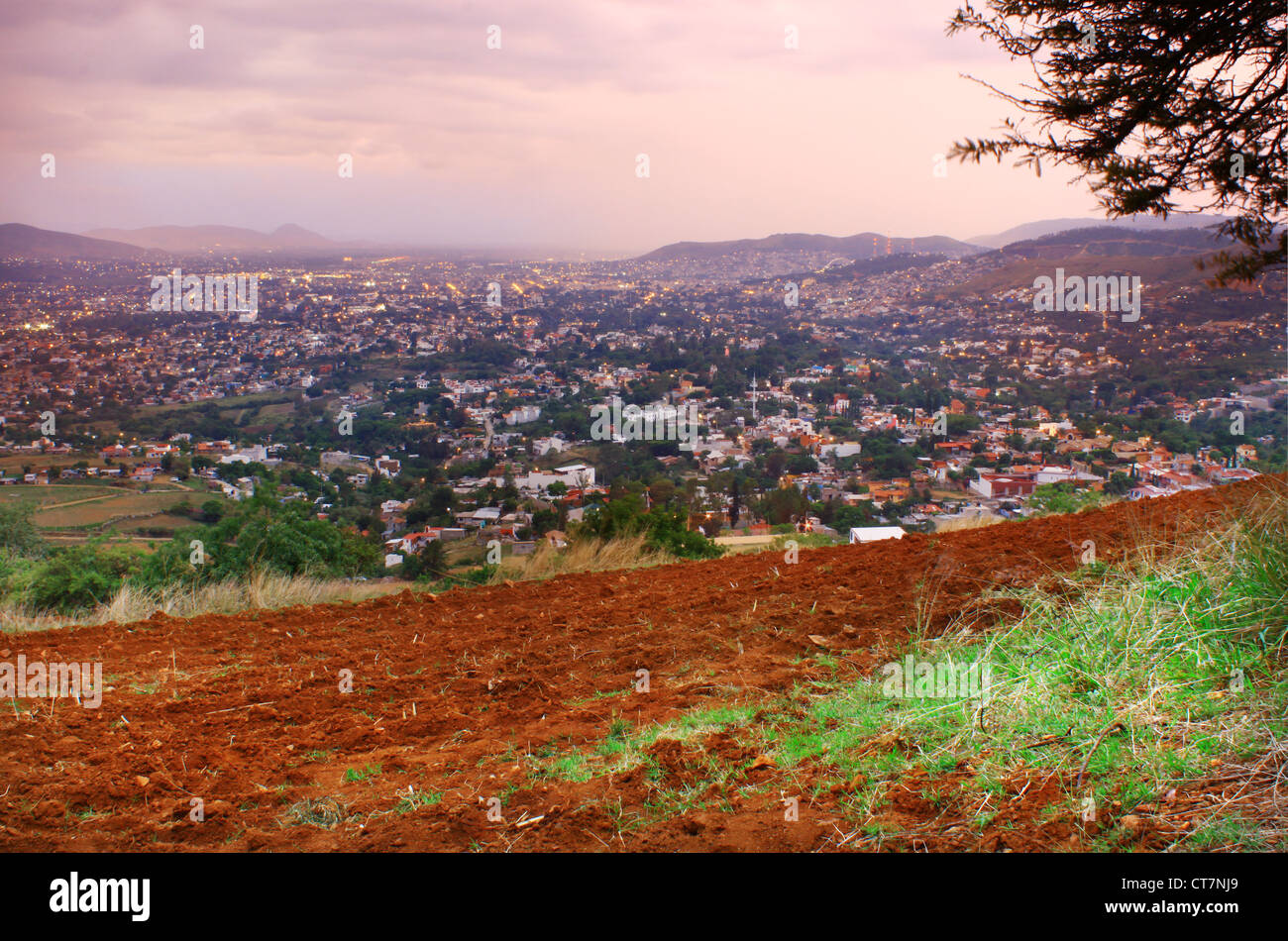 Evening lights coming on in Oaxaca, Oaxaca from panoramic mountainside ...