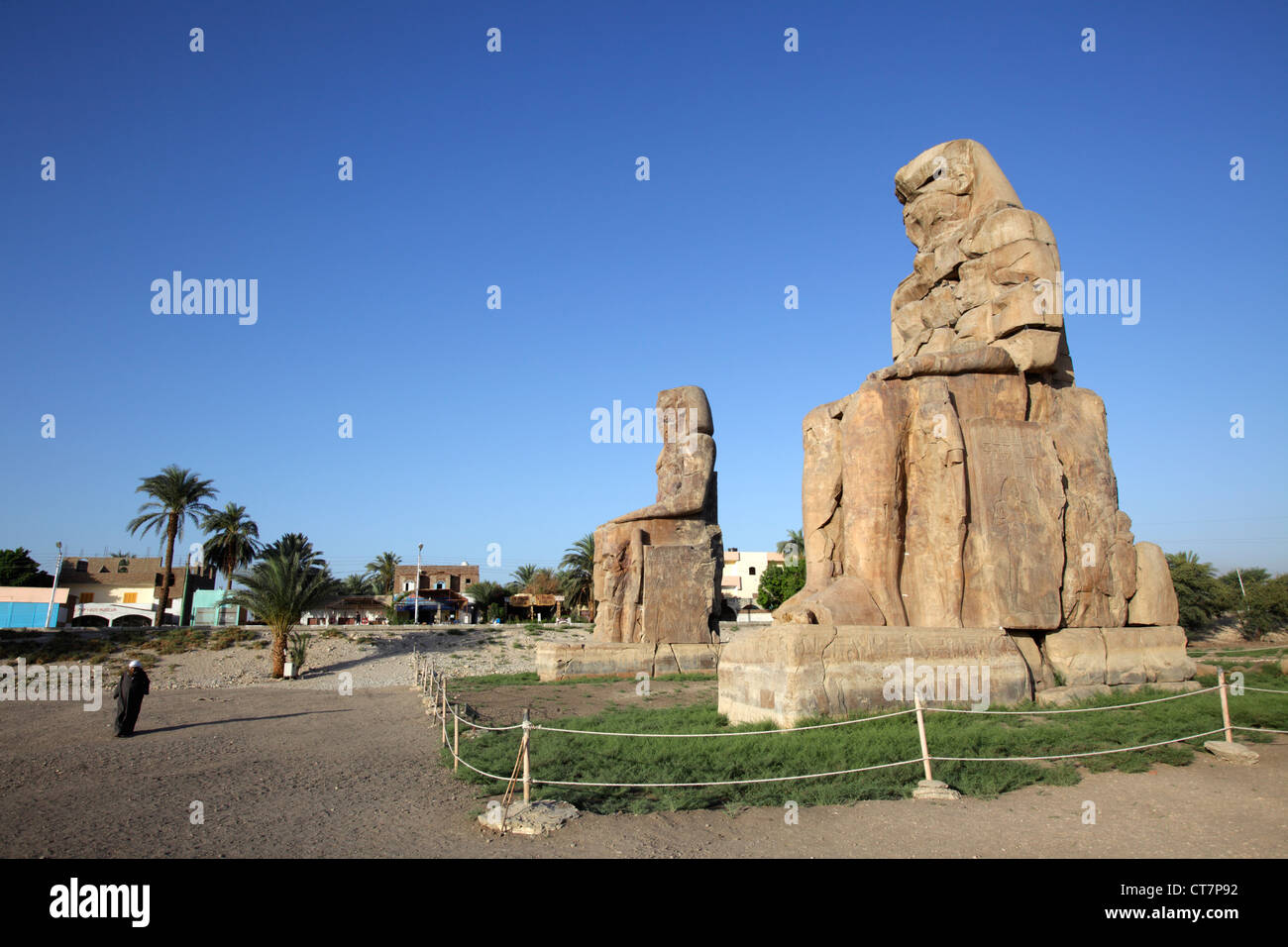 The Colossi of Memnon, the massive stone statues of Pharaoh Amenhotep ...