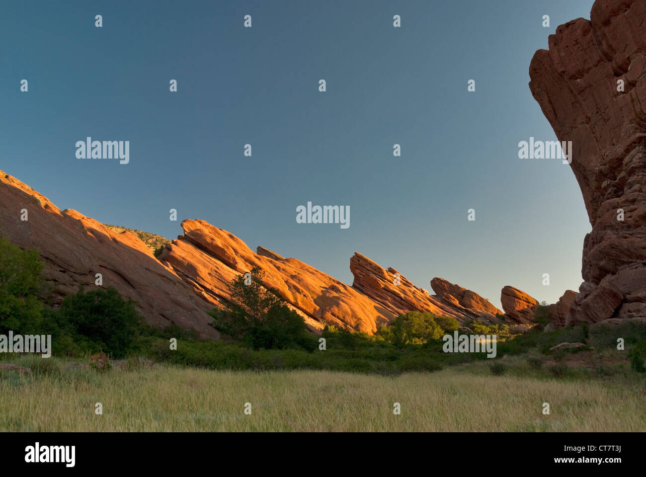 First light hits the Red Rocks in Colorado Stock Photo - Alamy