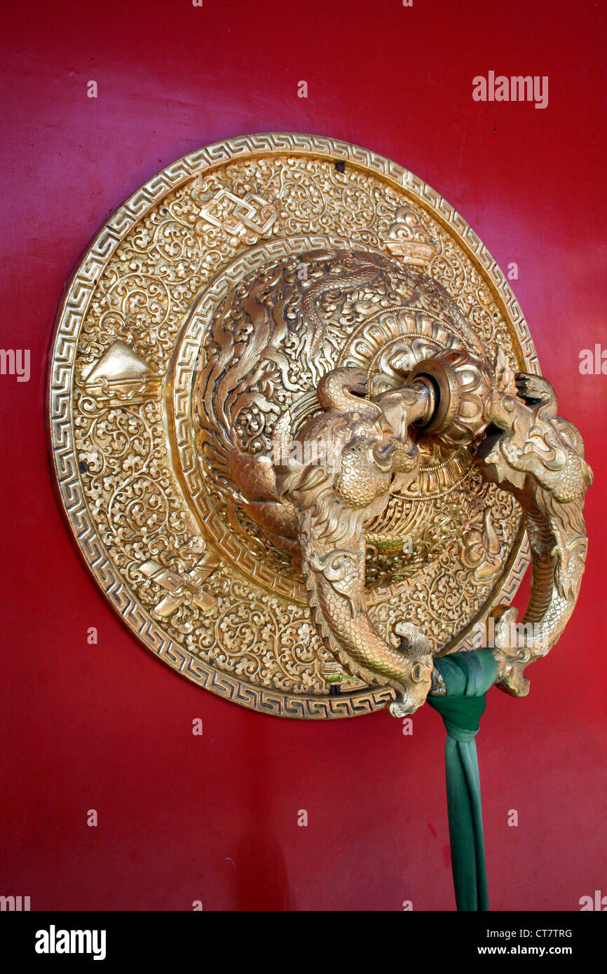 Golden door handle with highly decorative design work Stock Photo - Alamy