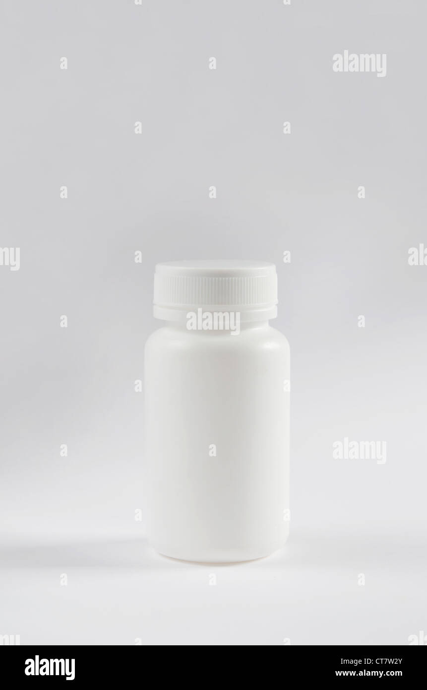 white plastic bottle for drugs on white Stock Photo - Alamy