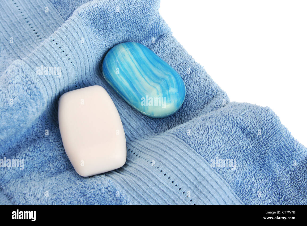 Towels and soaps on white background Stock Photo - Alamy