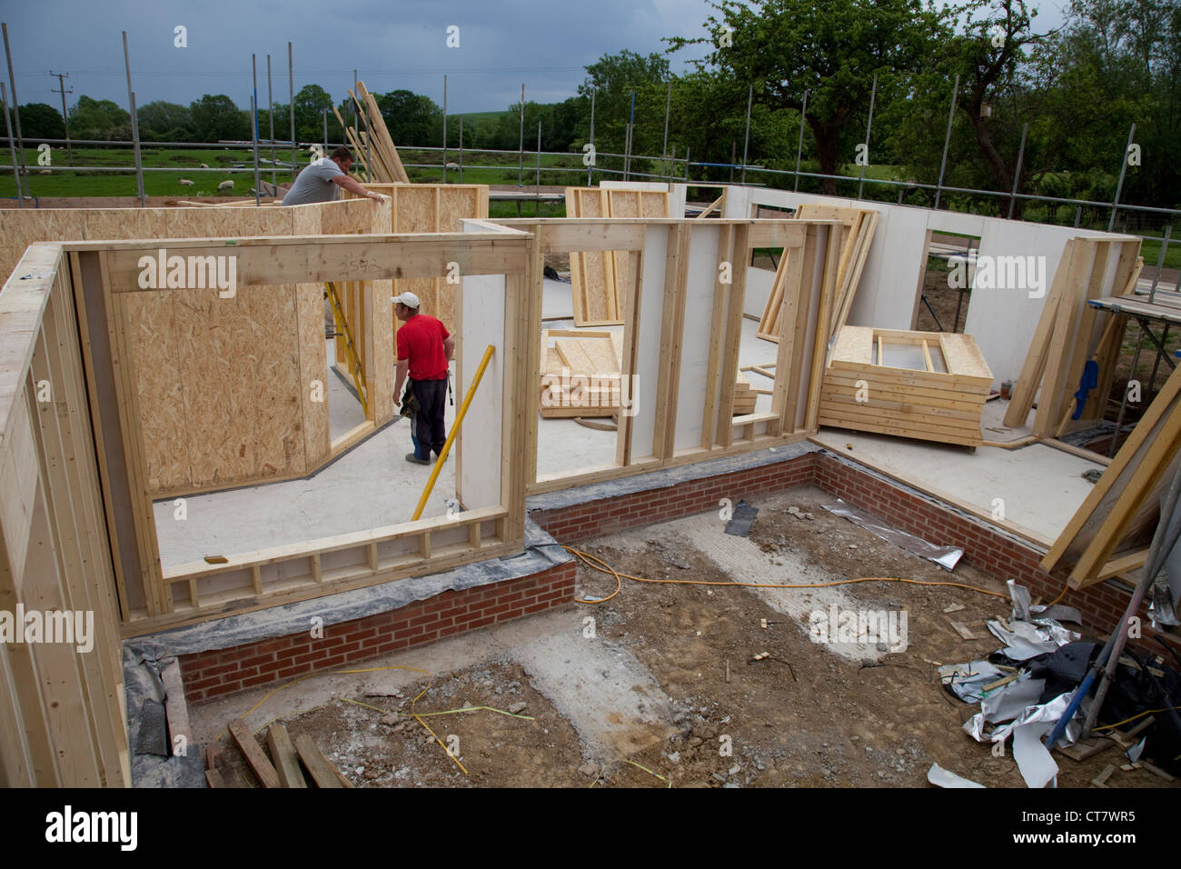 Fixing the stud walls on timber frame Colemans Hill Farm Ecobuild ...
