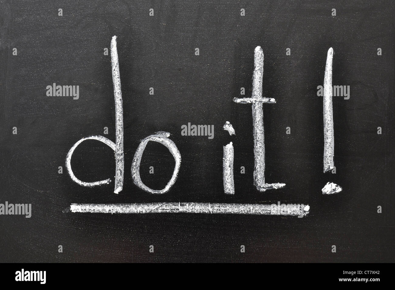 handwritten motivation words - Do it! on the school blackboard Stock ...