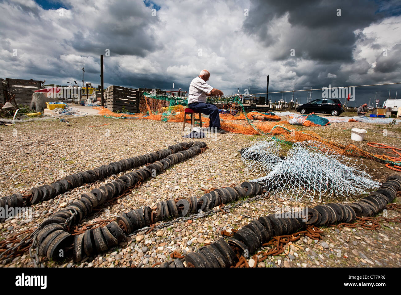 Uk fishermen mending nets hi-res stock photography and images - Alamy