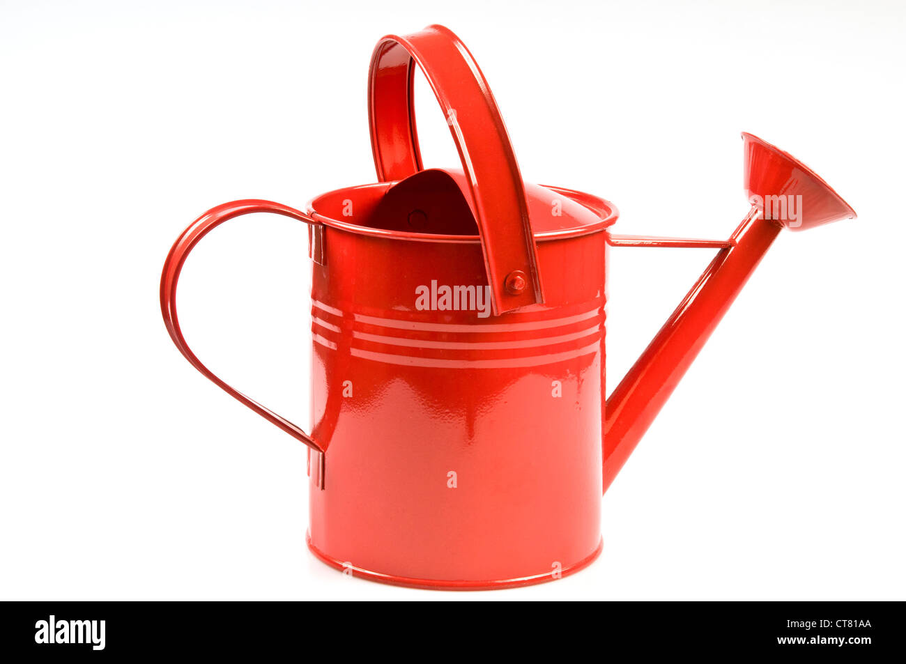 retro red watering can, isolated Stock Photo - Alamy