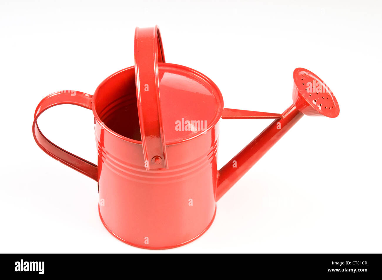 retro red watering can, isolated Stock Photo - Alamy
