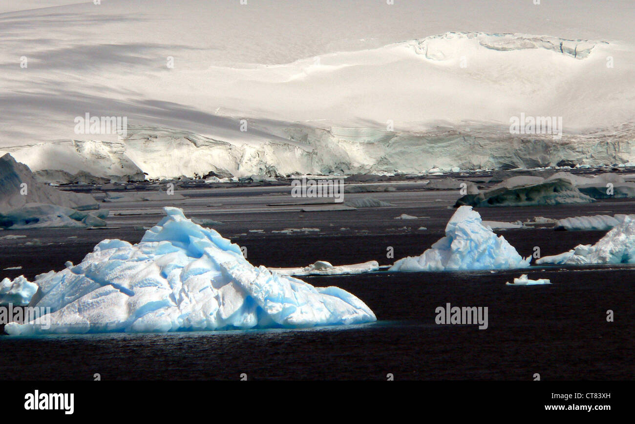 Antarctic rocks and icebergs Stock Photo - Alamy