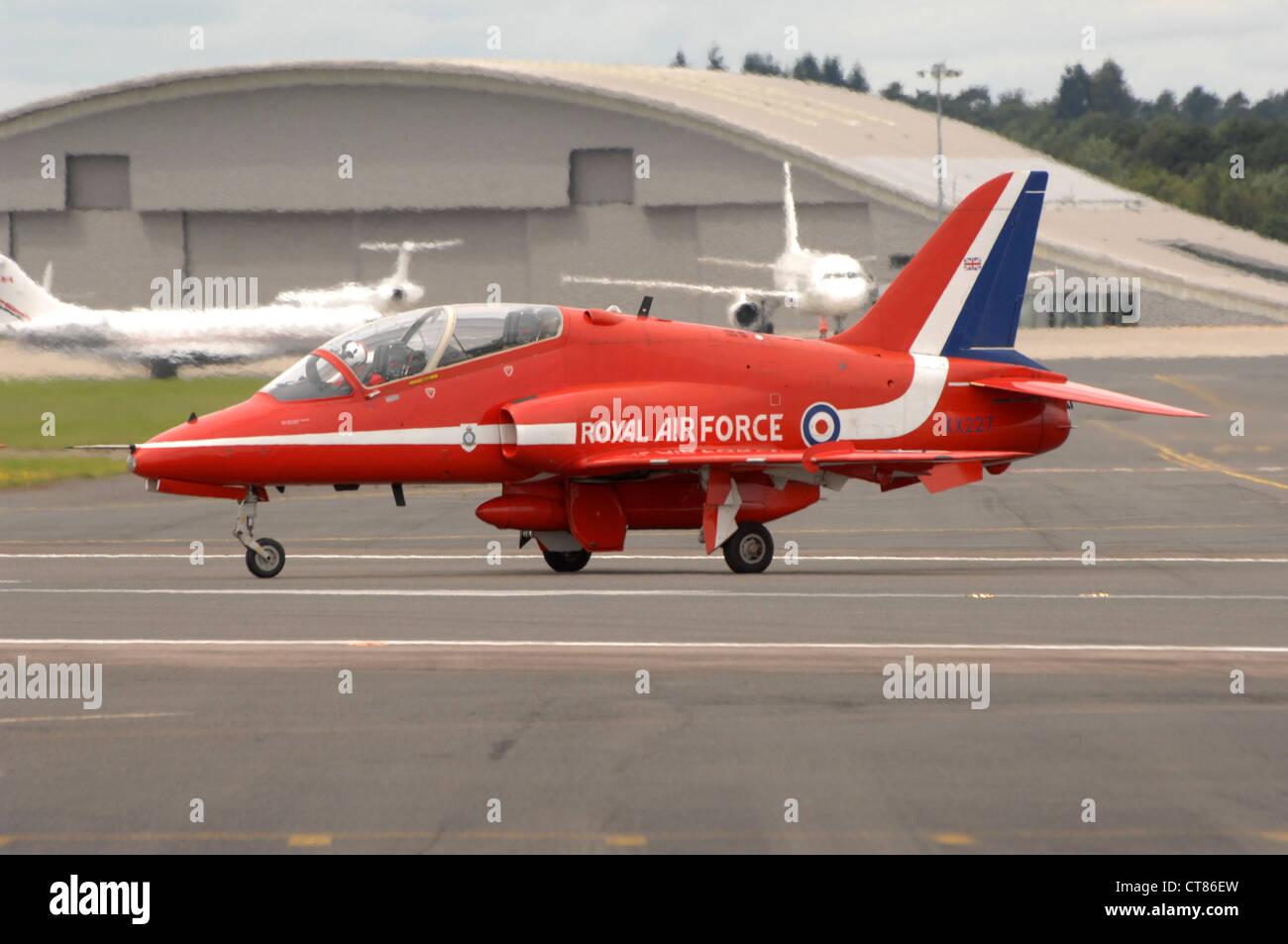 BAE Systems Hawk T1 of the RAF Red Arrows display team taxiing on the runway at Farnborough ...