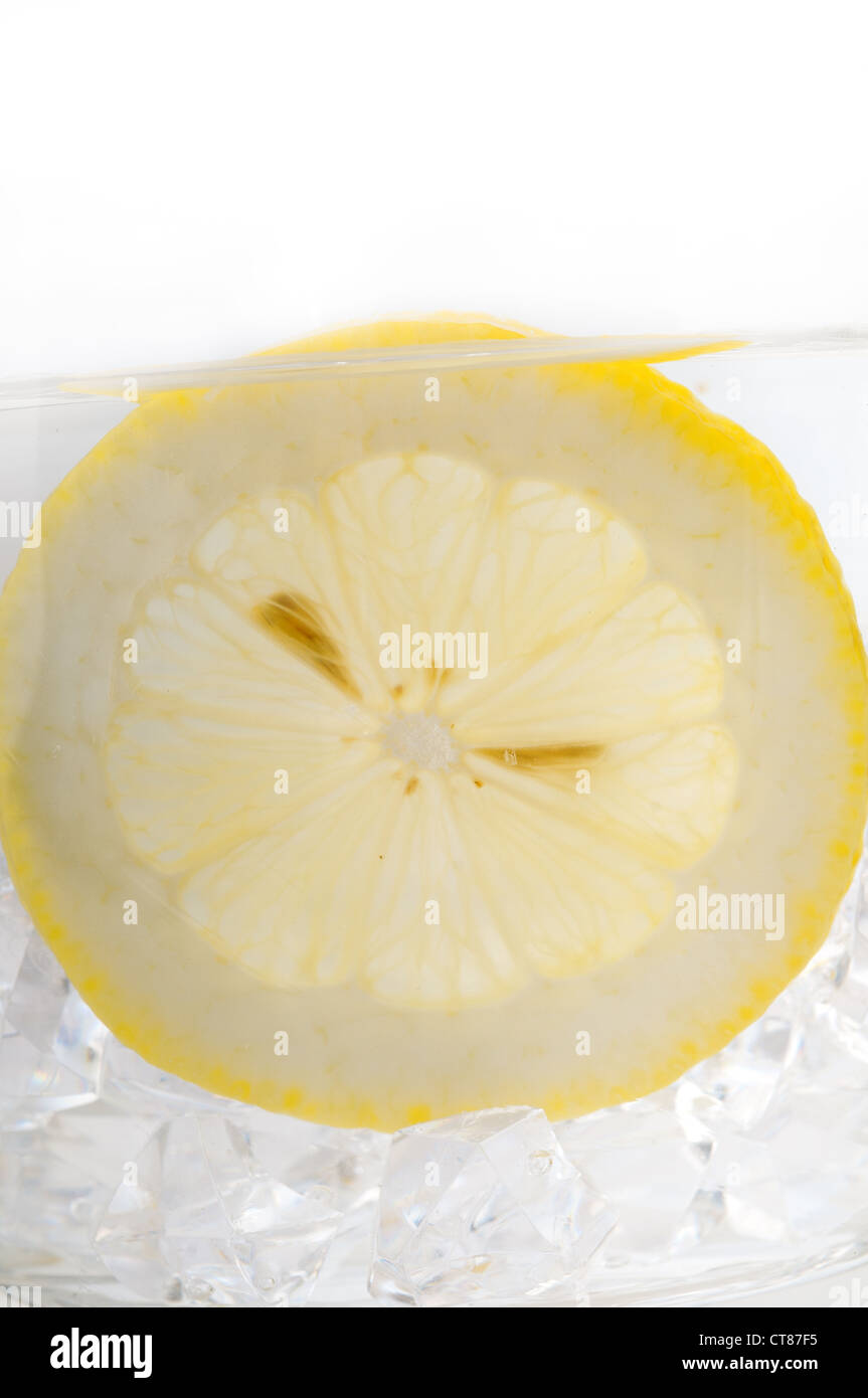 fresh lemonade drink with lemon slice closeup Stock Photo - Alamy