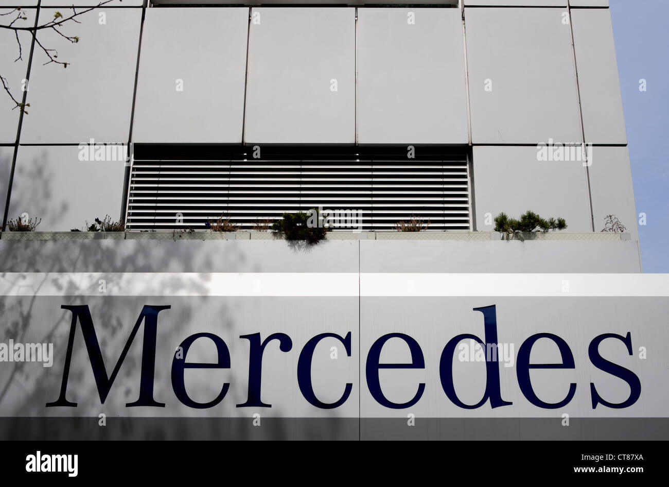 MERCEDES lettering on a building Stock Photo - Alamy