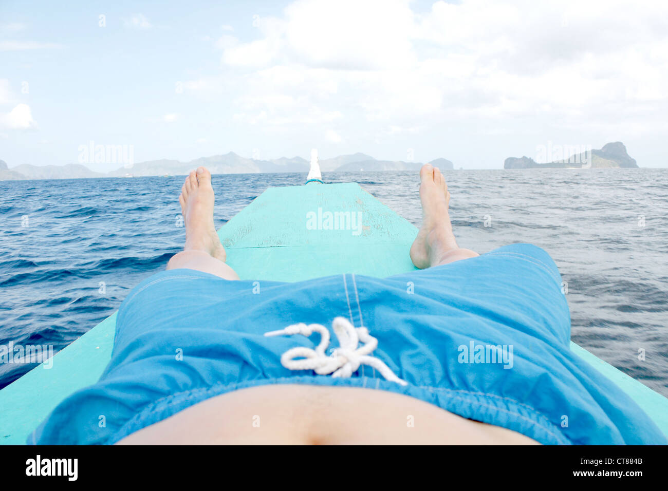 Relaxing on boat Stock Photo - Alamy