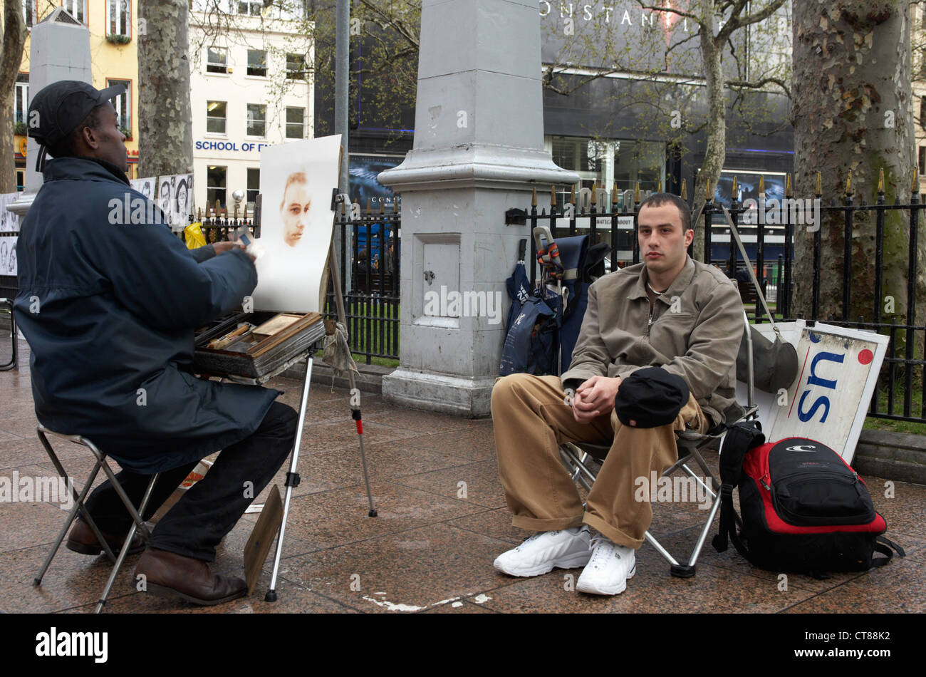 London - street artists portrayed a young man Stock Photo - Alamy