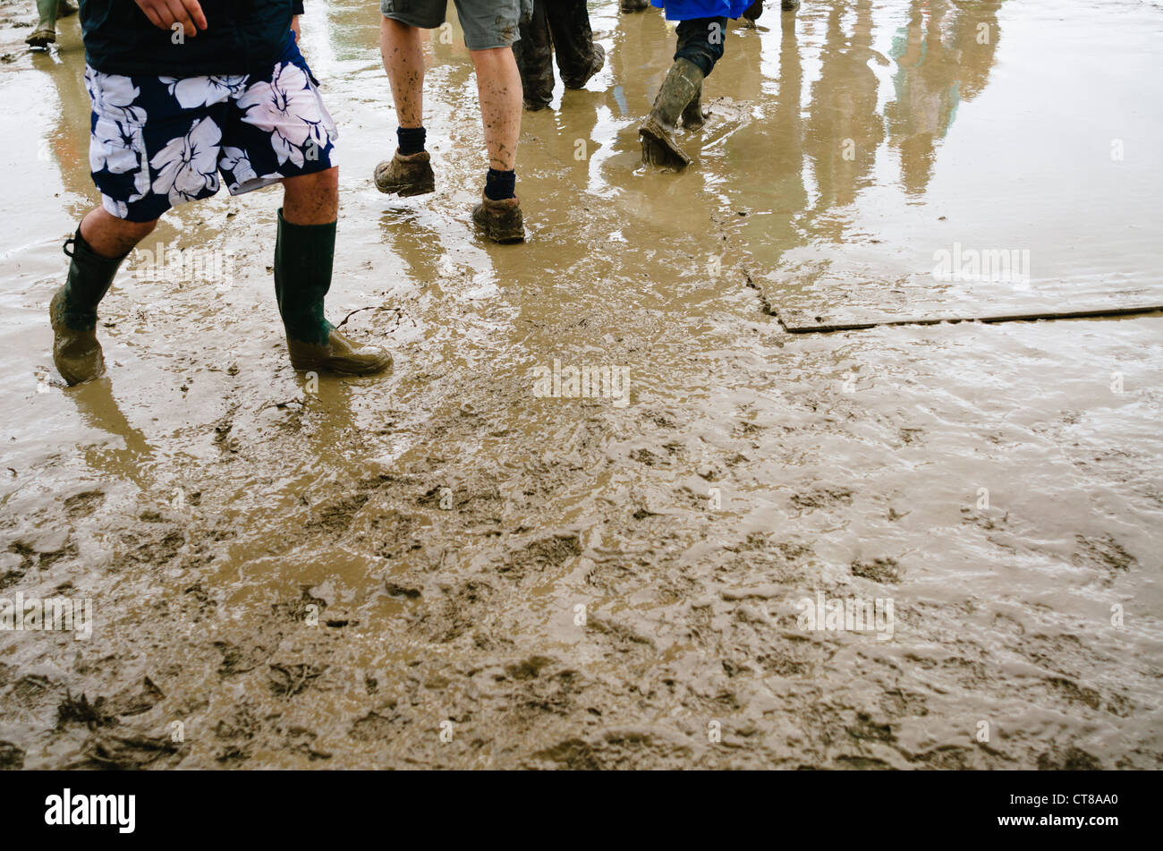Walking through the mud at the Glastonbury festival 2011 Stock Photo ...