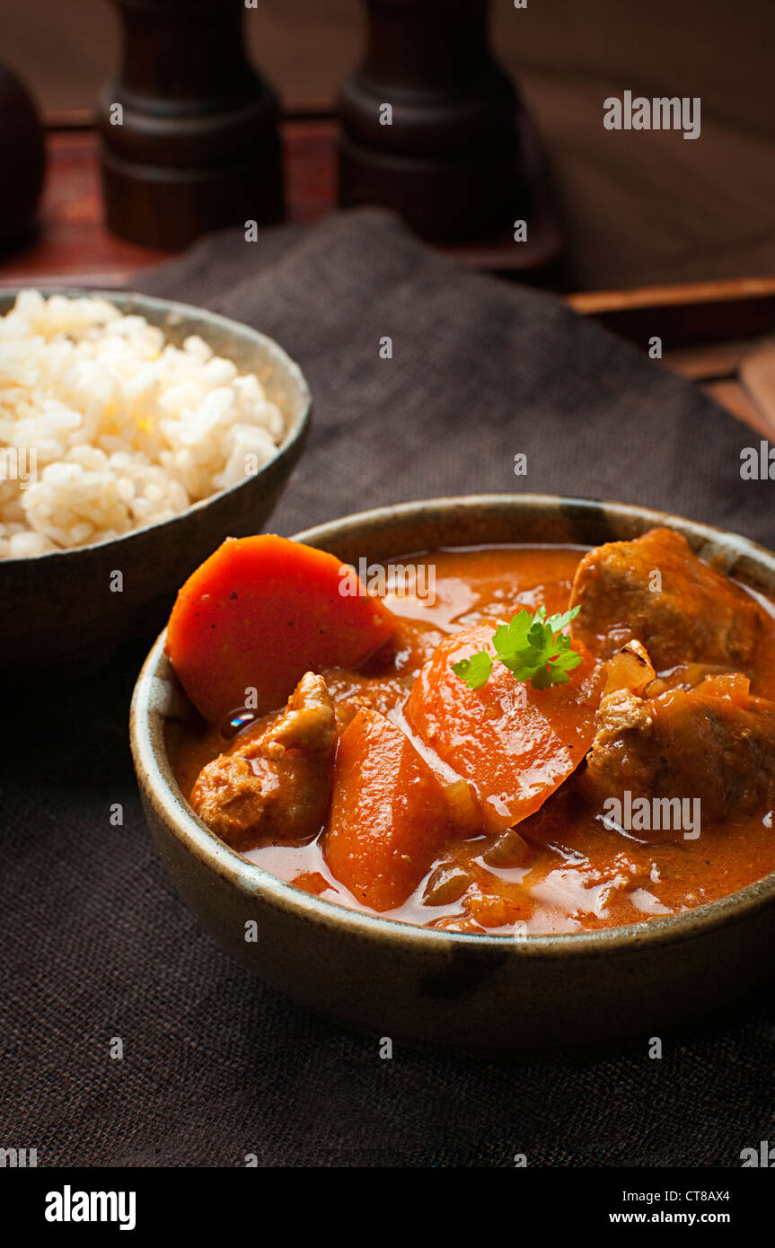 Chicken brown rice curry hi-res stock photography and images - Alamy