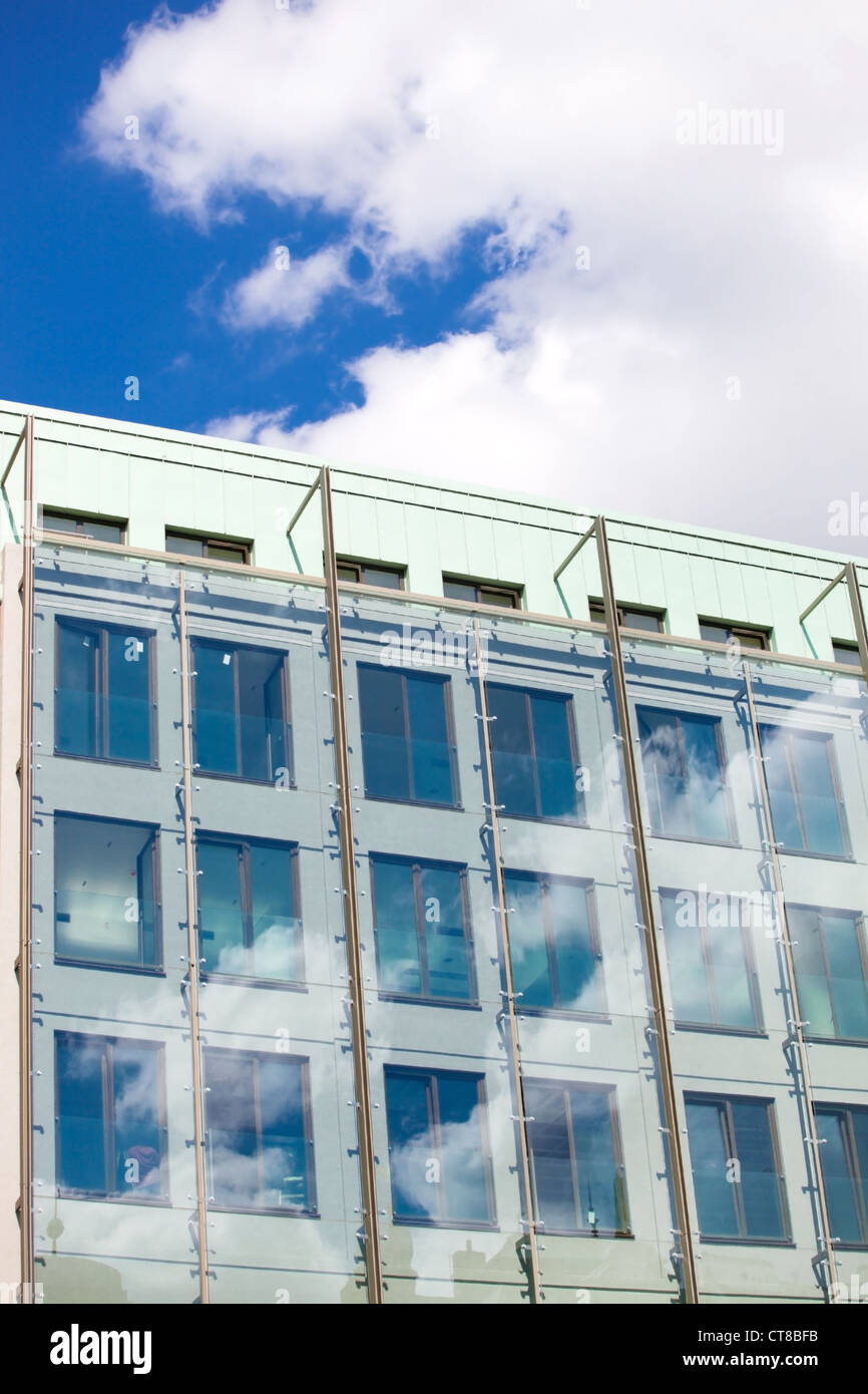 Skyscraper with clouds Stock Photo - Alamy