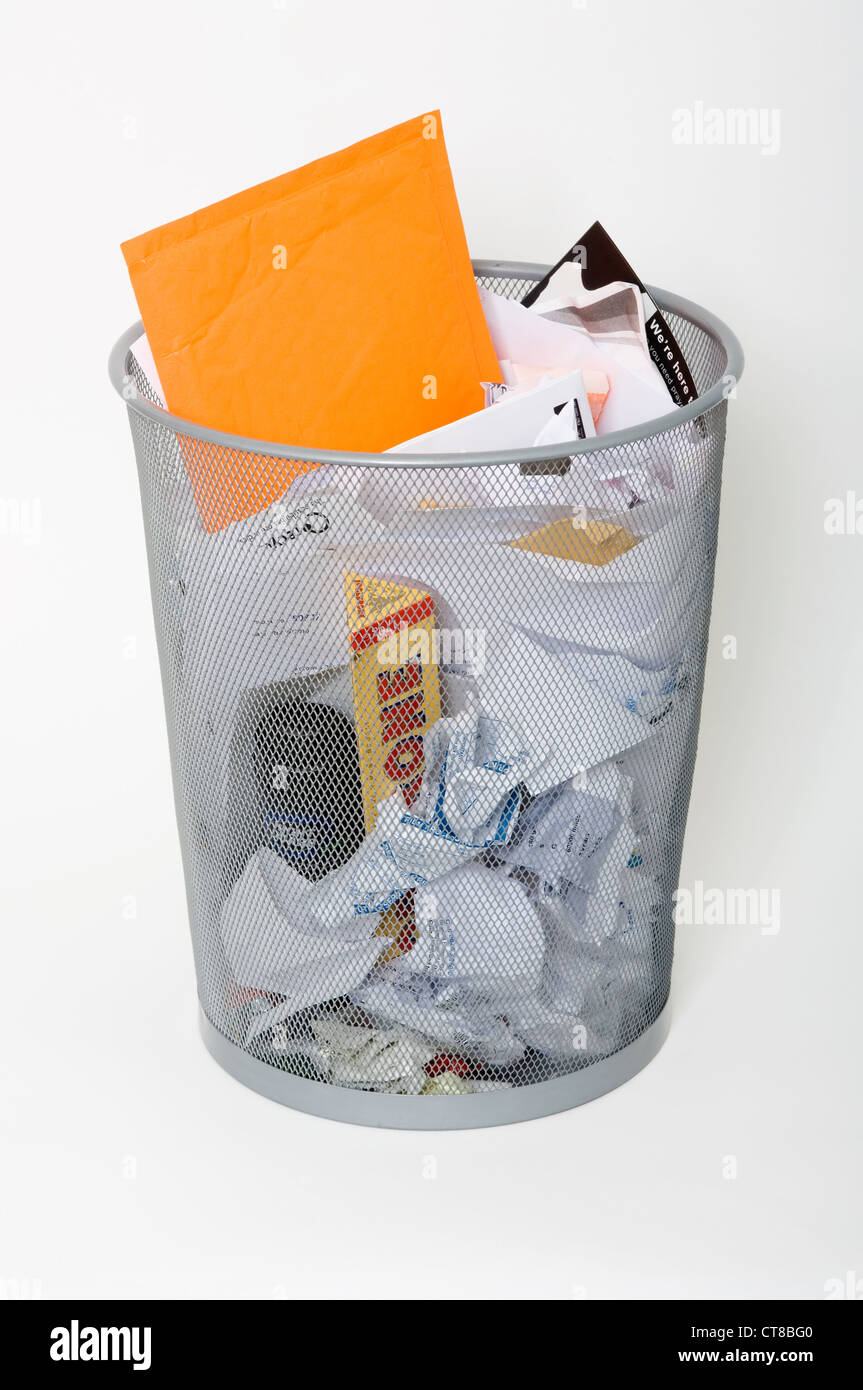 Waste paper basket filled with rubbish Stock Photo - Alamy