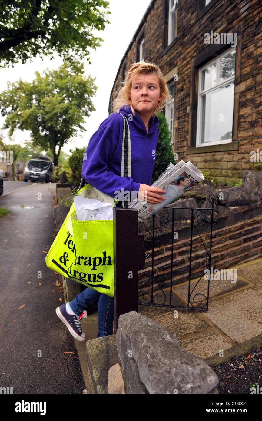 A Paper girl delivers newspapers to houses, first job, North Yorkshire ...