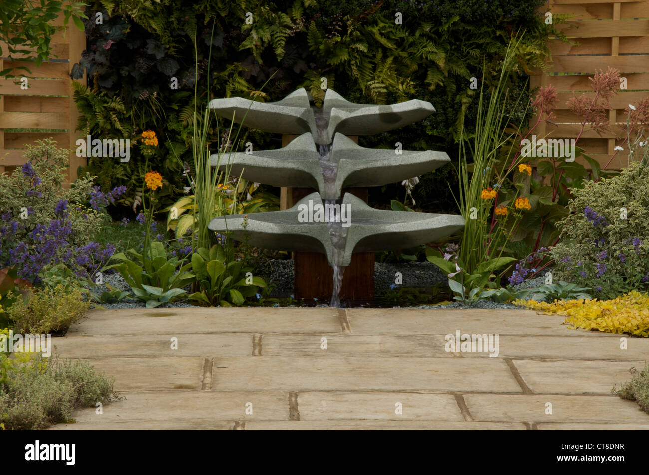 The water feature in the Old &New Garden at RHS Hampton Court Palace ...