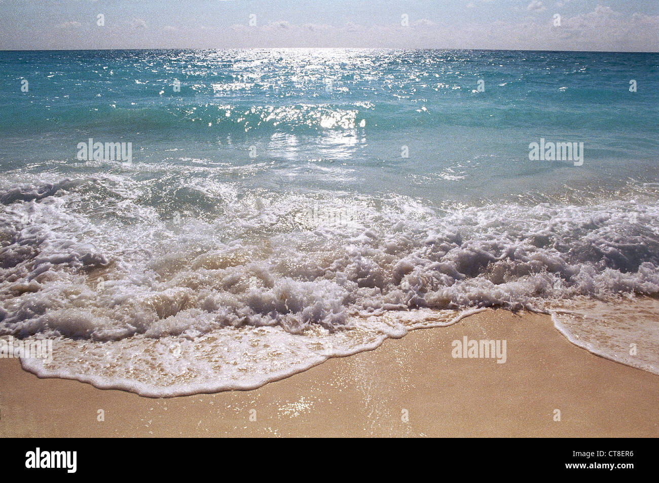 Pipe with beating on the beach sea wave tuerkisblauen Stock Photo - Alamy
