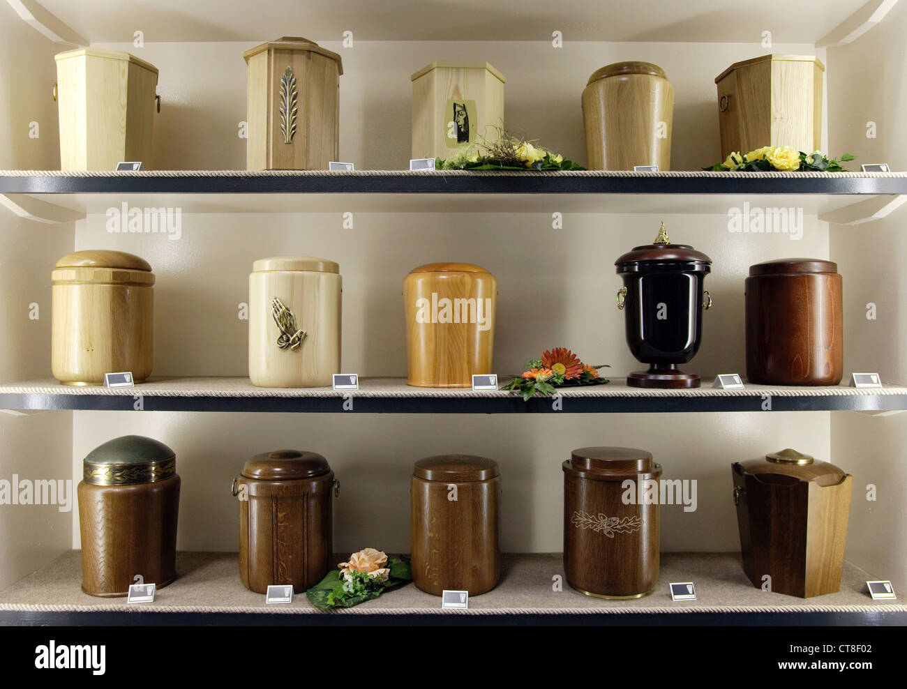 Wooden urns on BEFA undertaker fair in Duesseldorf Stock Photo - Alamy