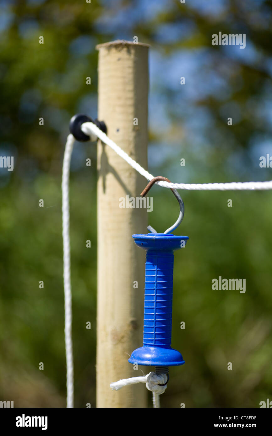 Electric fence gate handle with electric rope & wooden post Stock Photo ... Electric fence gate handle with electric rope & wooden post Stock Photo ...