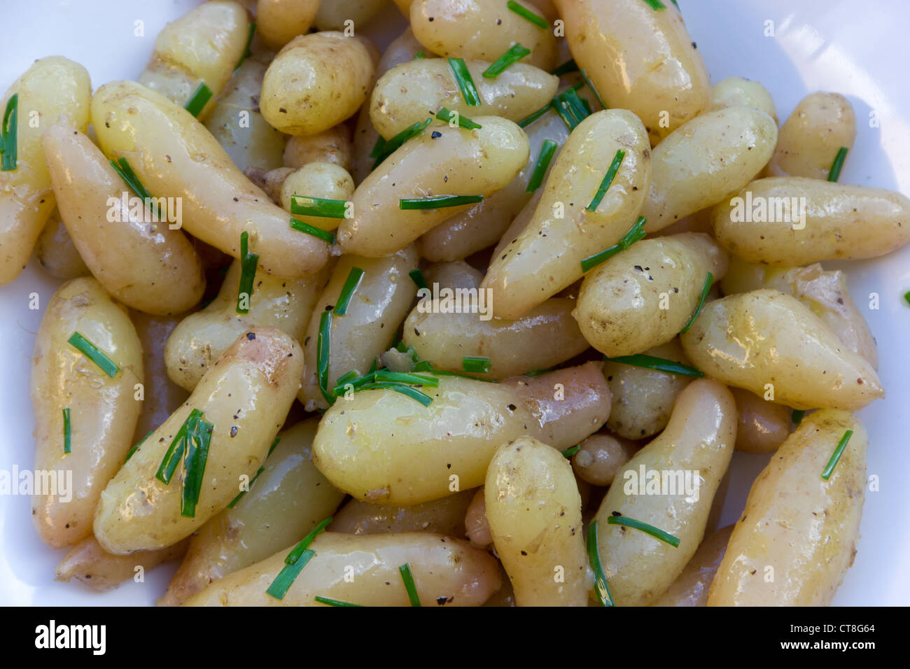 A bowl of cooked Anya new potatoes Stock Photo - Alamy