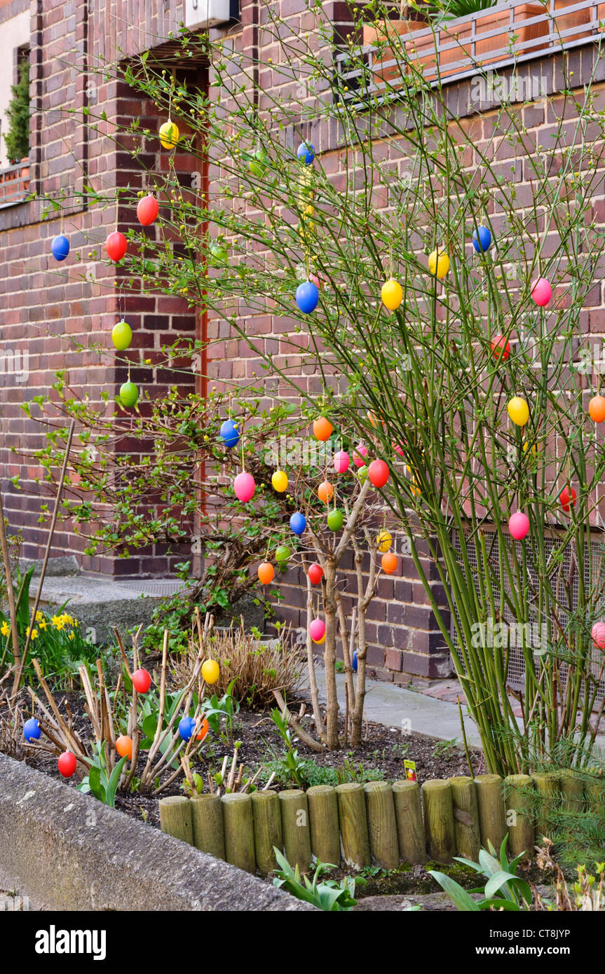 Shrub with Easter eggs Stock Photo - Alamy