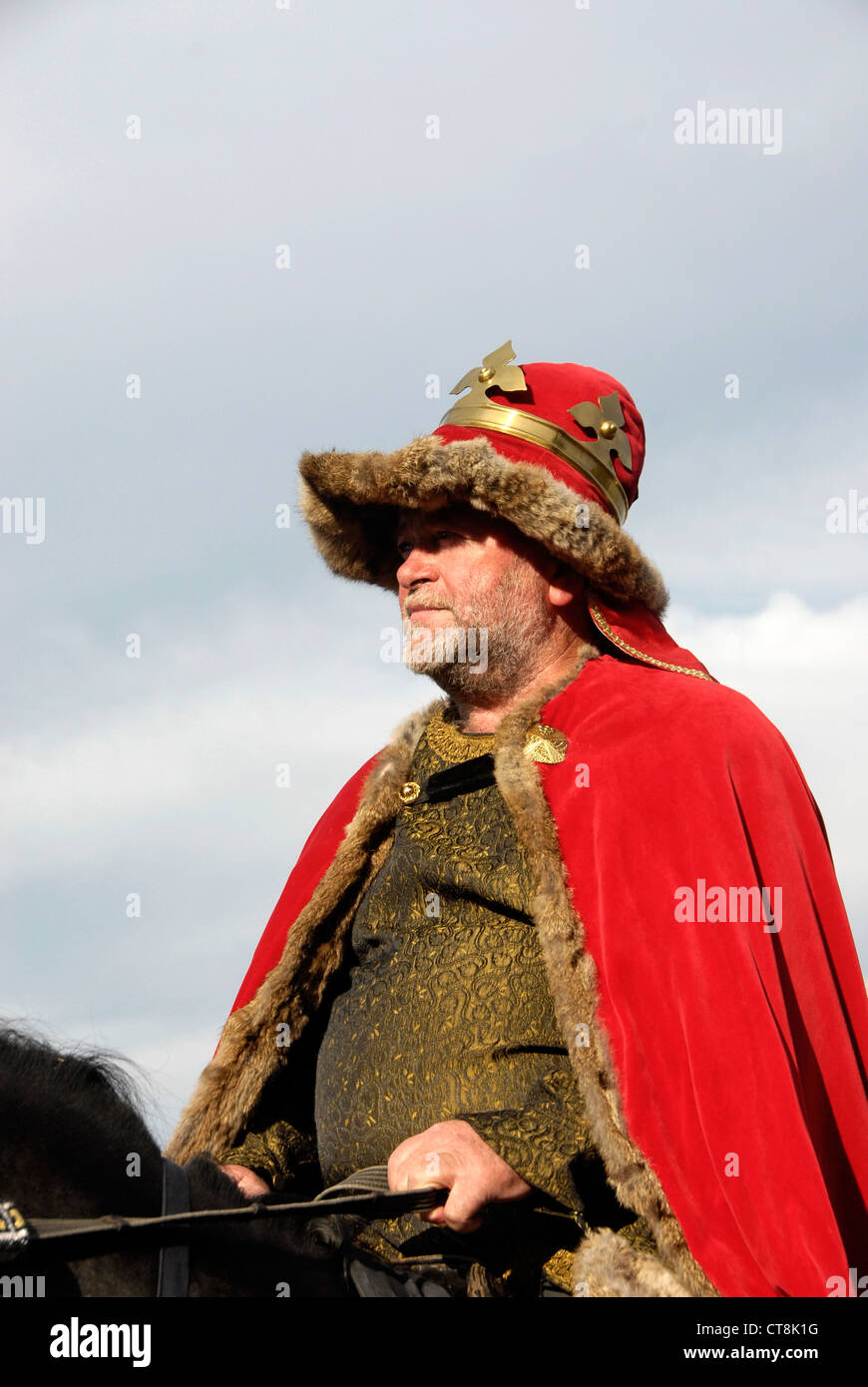 Costumed actors on horses playing roles of medieval characters in ...