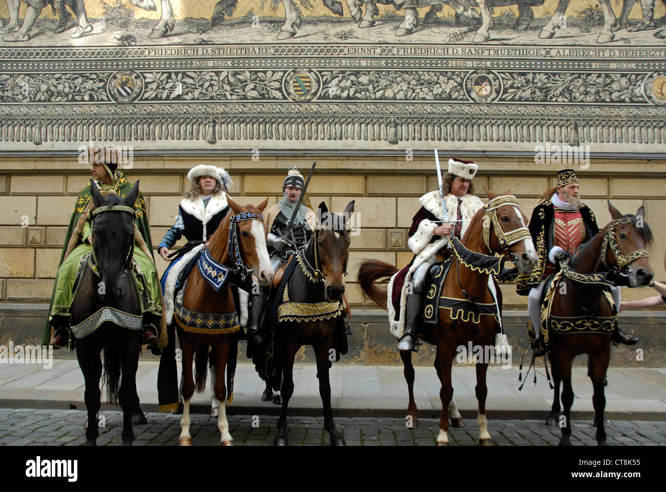 Costumed actors on horses playing roles of medieval characters in ...