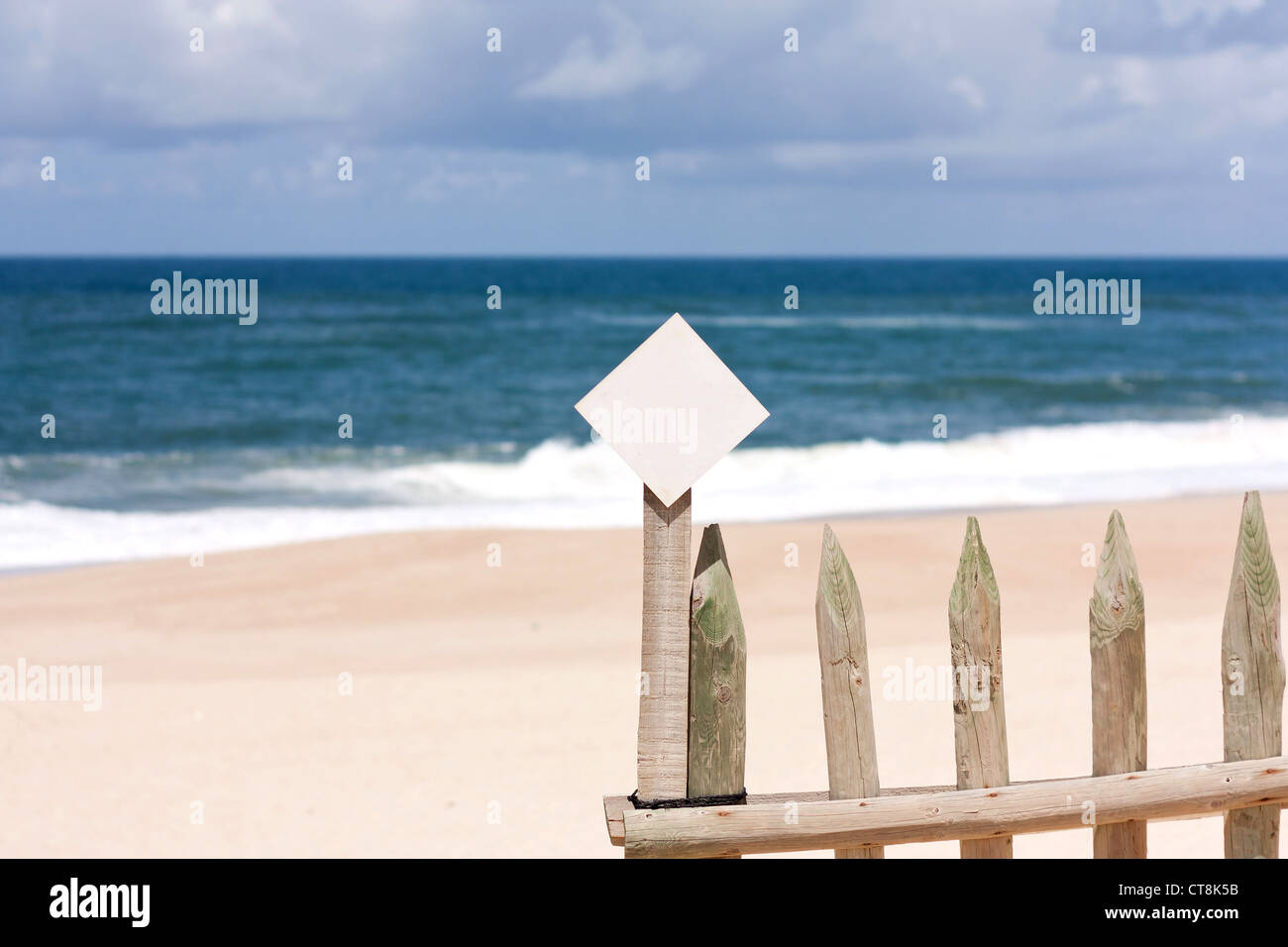 Small Board sign on the beach Stock Photo - Alamy