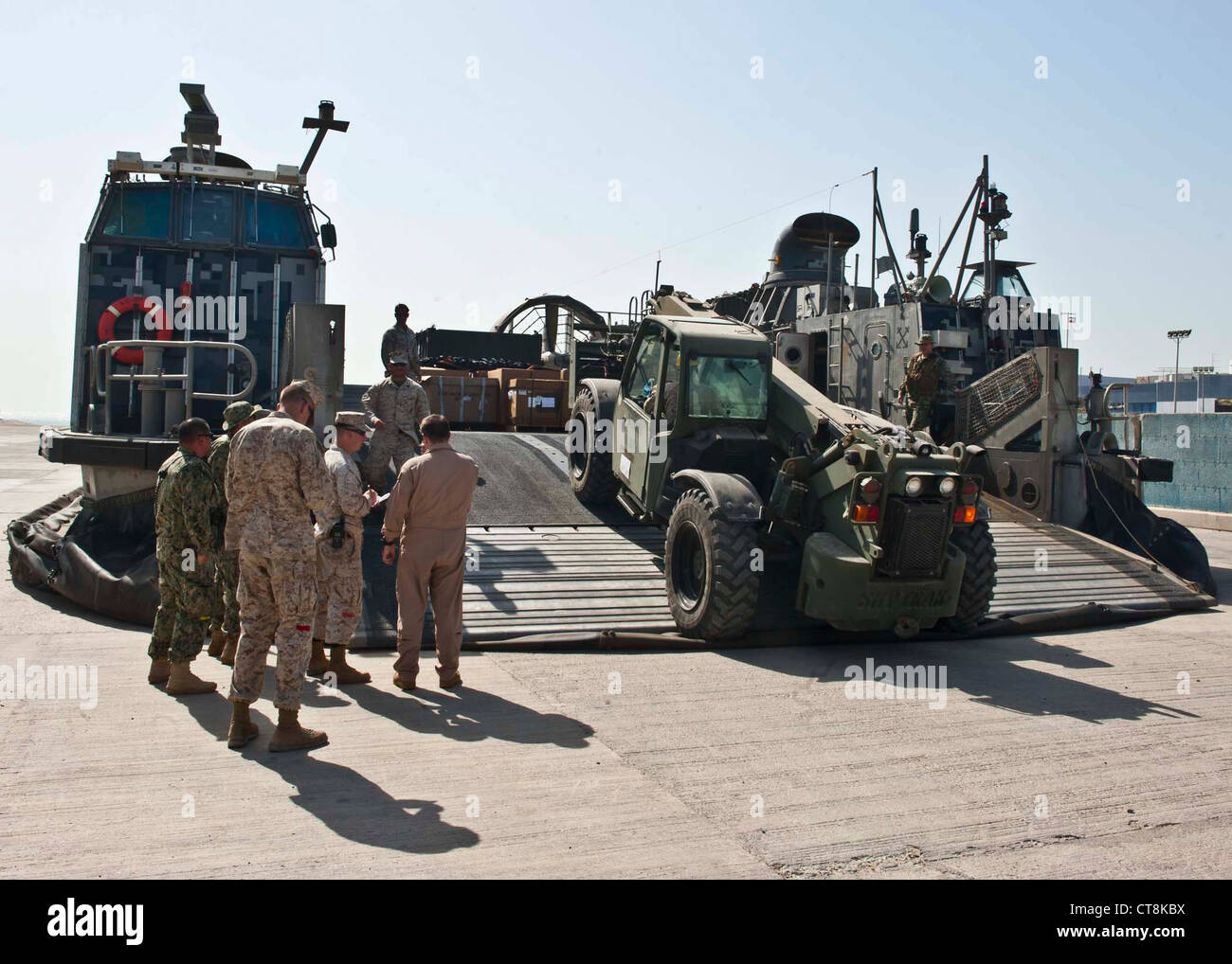 Sailors marines unload cargo from landing craft air cushion hi-res ...