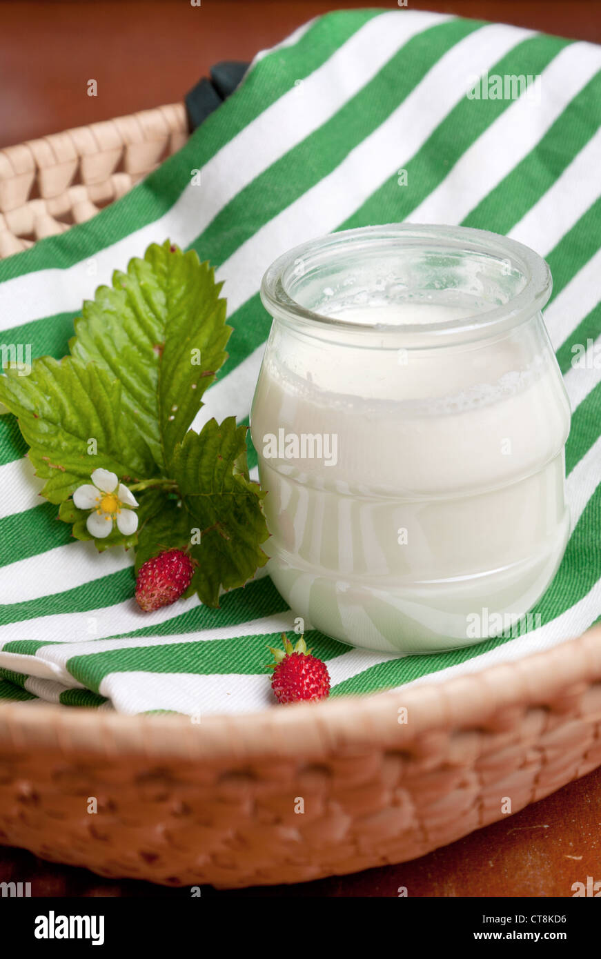 Glass pot of creamy natural yogurt Stock Photo - Alamy