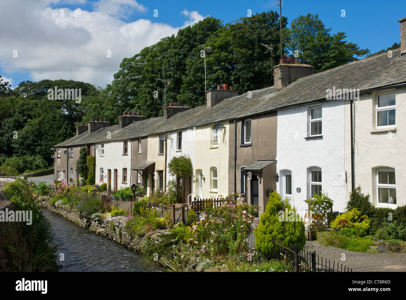 The River Eea running through the village of Cark-in-Cartmel, South ...