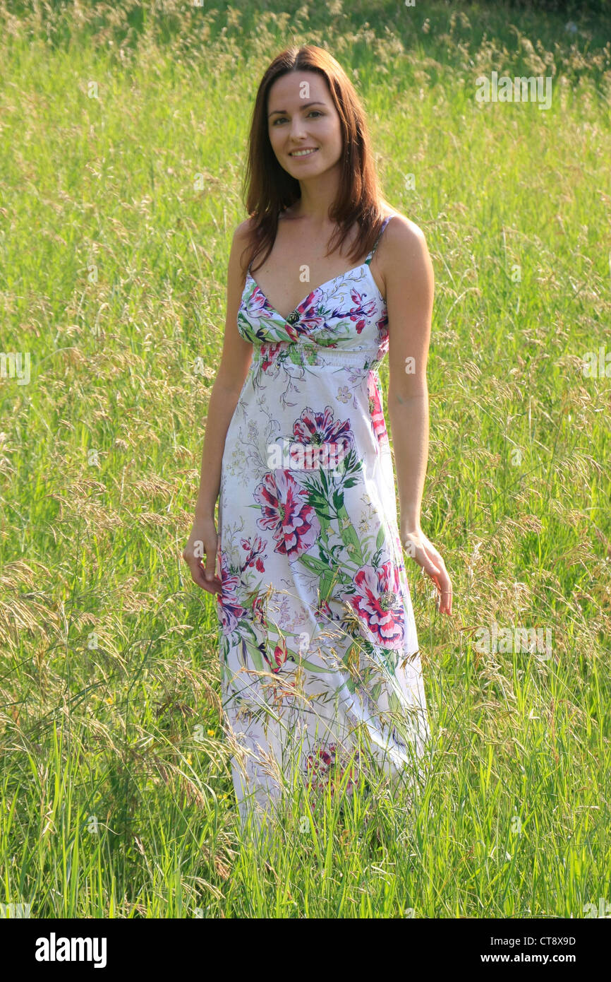 Tall woman standing hi-res stock photography and images - Alamy