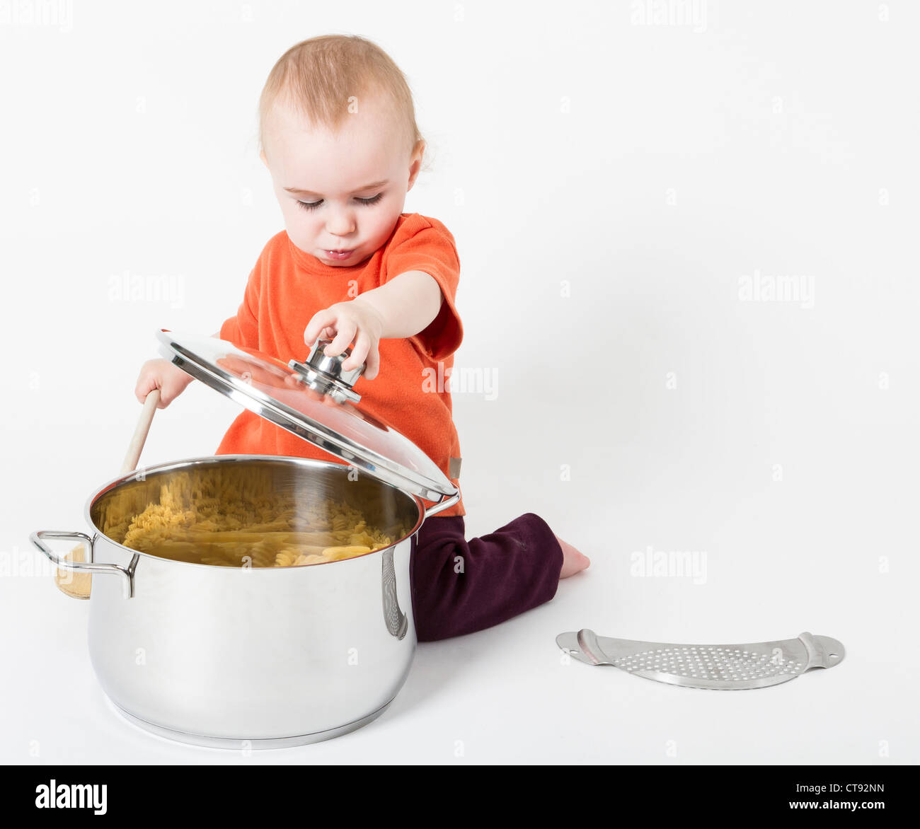 One person cooking in big pot hi-res stock photography and images - Alamy