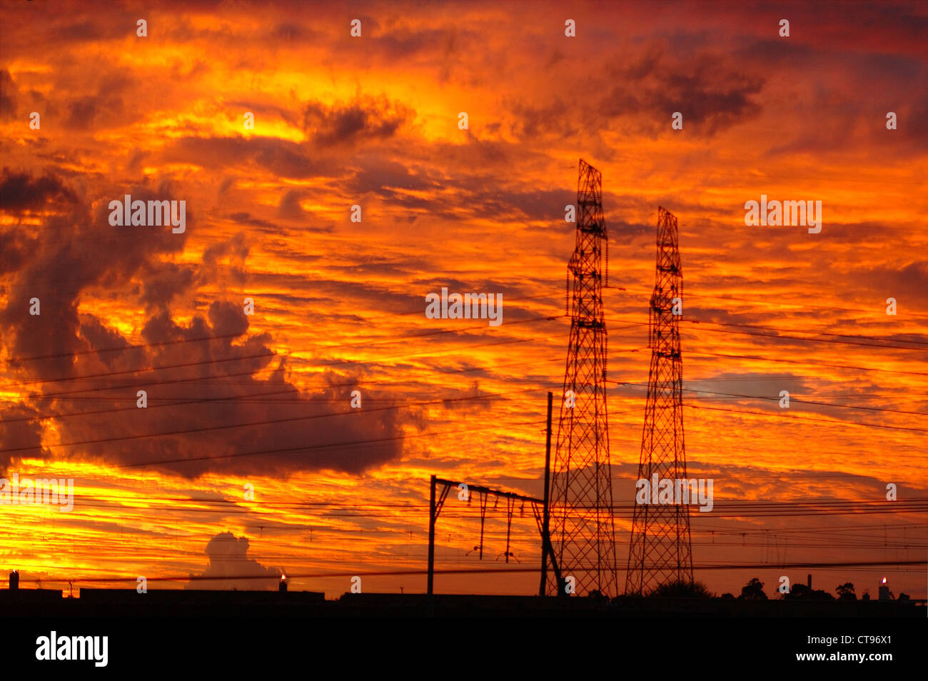 Pylons at sunset Stock Photo - Alamy
