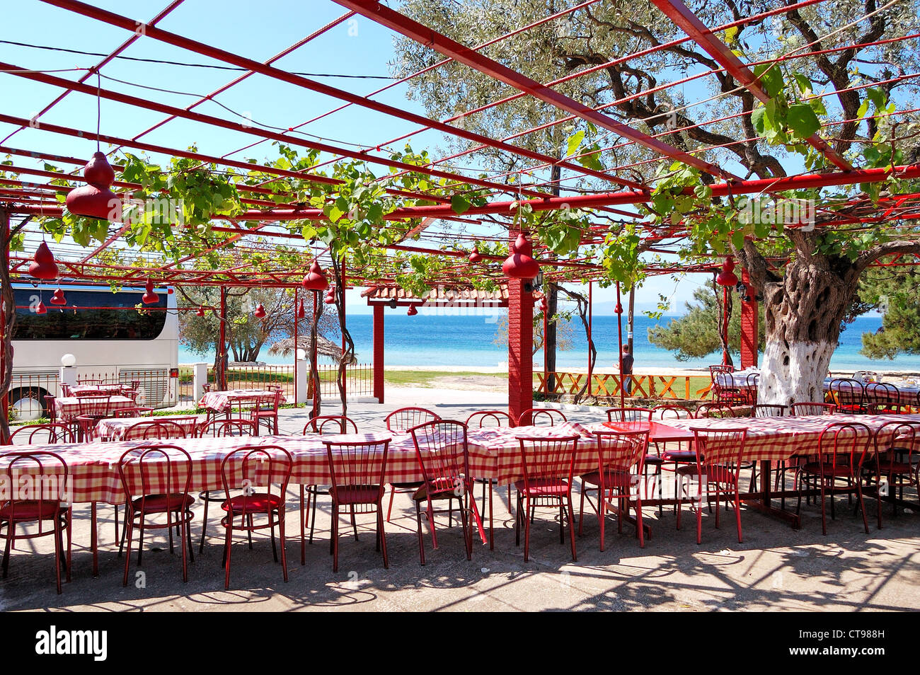 Traditional Greek outdoor tavern at the beach, Thassos island, Greece ...