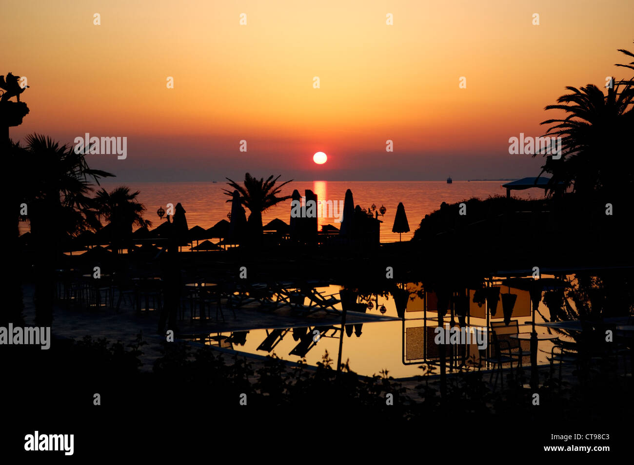 Sunset at beach of the luxury hotel, Halkidiki, Greece Stock Photo - Alamy