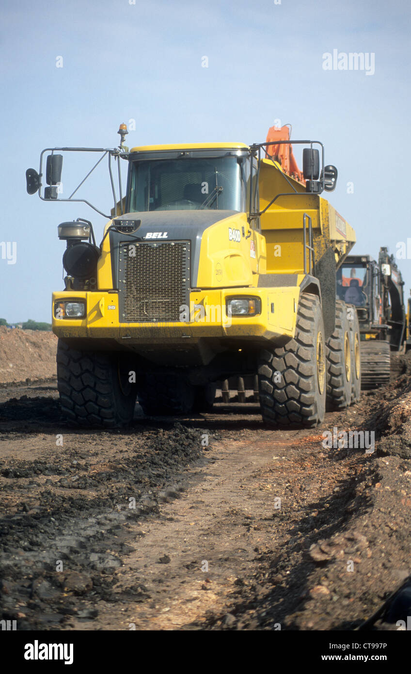 South African 'Bell Dumper Truck-B4OD' operating in an expanse of ...