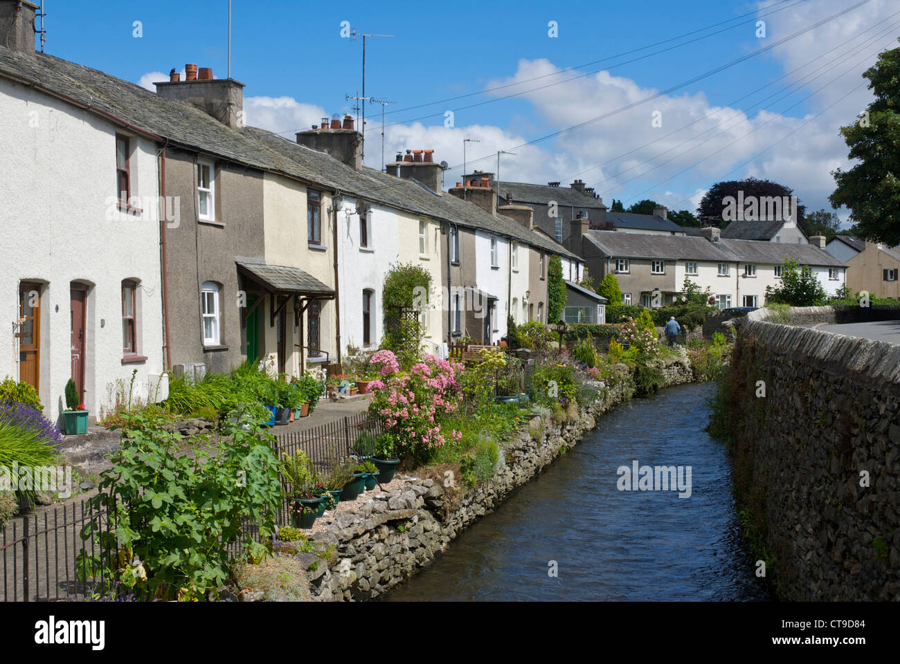 The River Eea running through the village of Cark-in-Cartmel, South ...