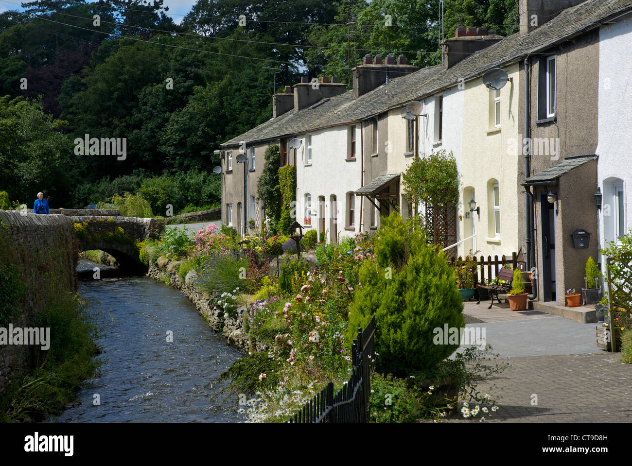 The River Eea running through the village of Cark-in-Cartmel, South ...