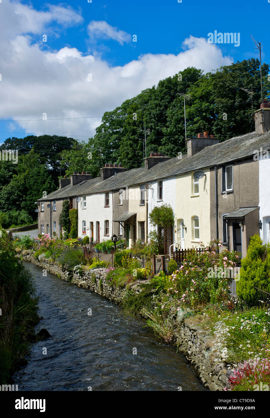 The River Eea running through the village of Cark-in-Cartmel, South ...