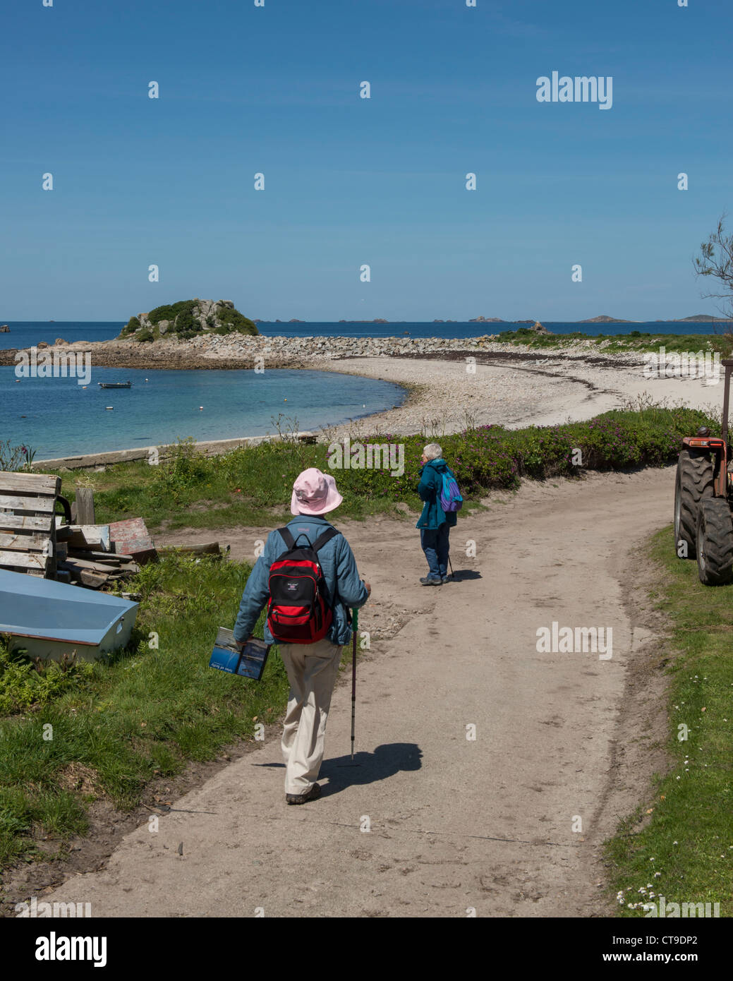A couple of retired women ramblers at Periglis Cove. St Agnes, Isles of ...