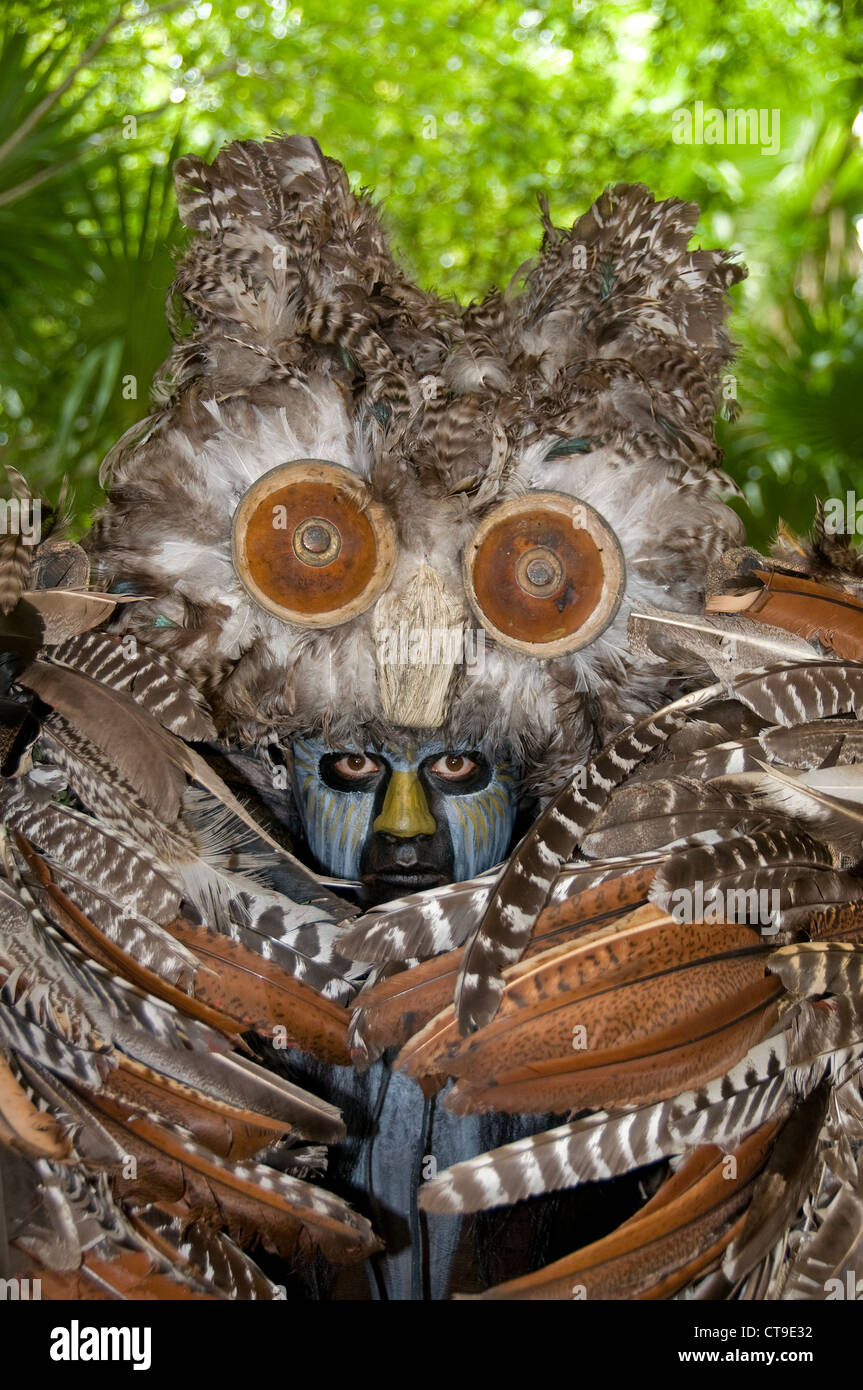 A Maya dancer in owl costume at the Riviera Maya's Xcaret Park in ...