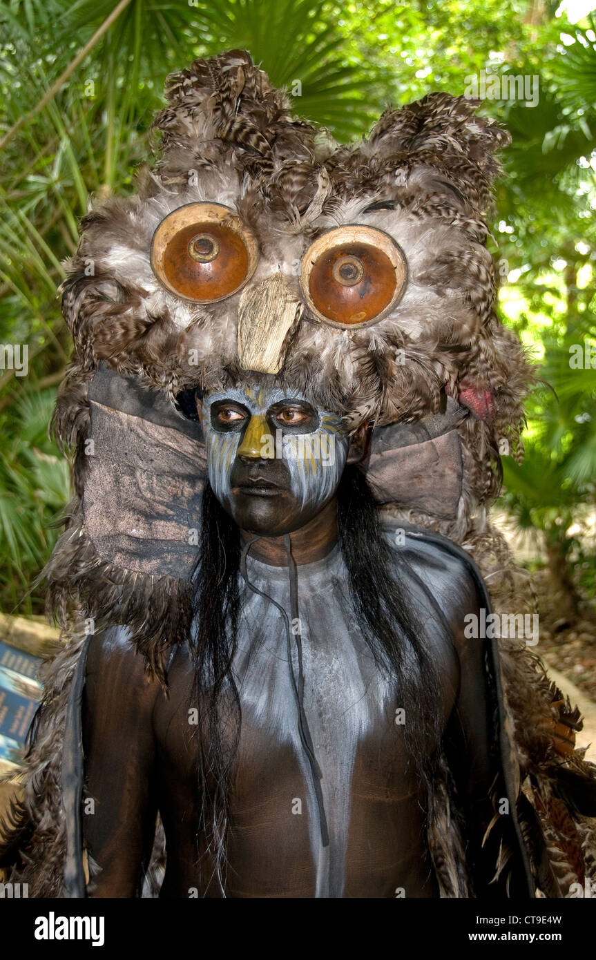 A Maya dancer in owl costume at the Riviera Maya's Xcaret Park in ...