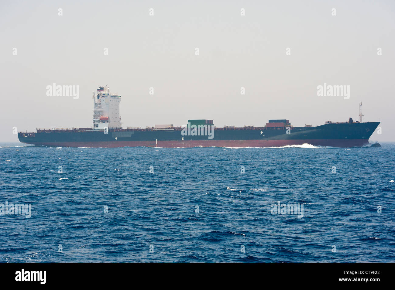 Large industrial container ship under way out at sea Stock Photo - Alamy